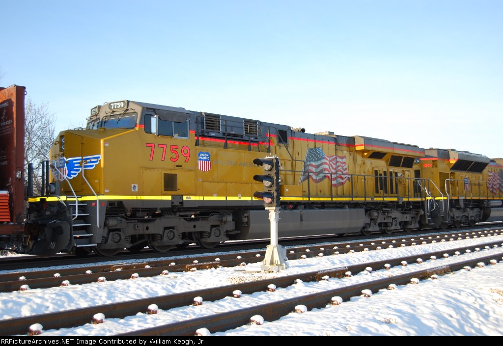 UP 7759 is the second unit on a heavy freight train